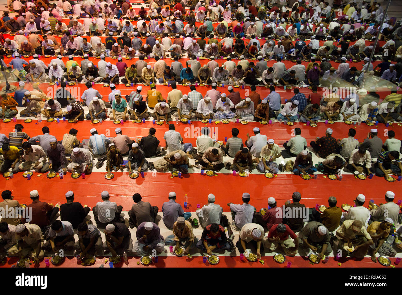 Devotees at a mass-iftar gathering at Baitul Mukarram National Mosque ...