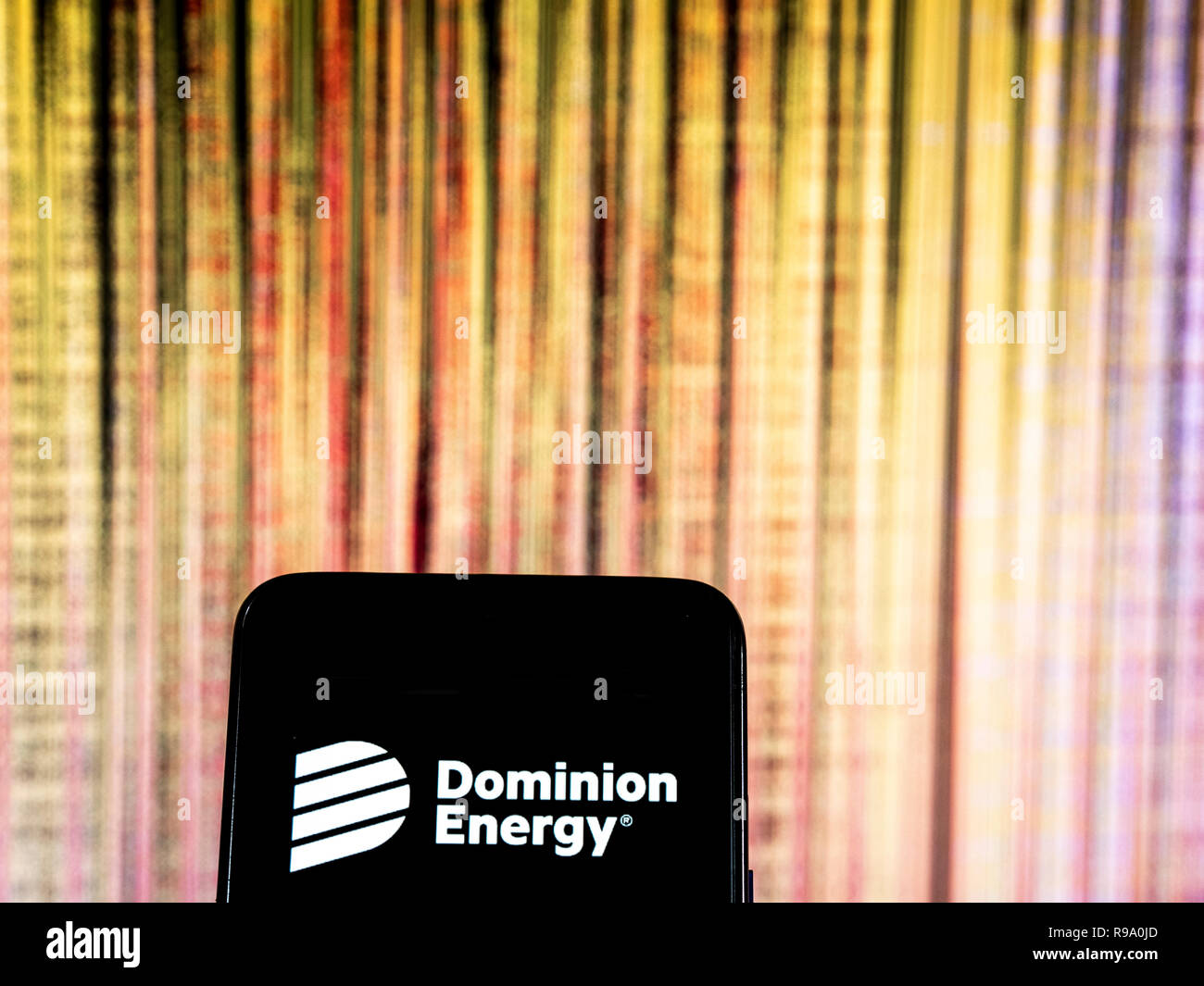Dominion Energy Company logo seen displayed on smart phone Stock Photo ...