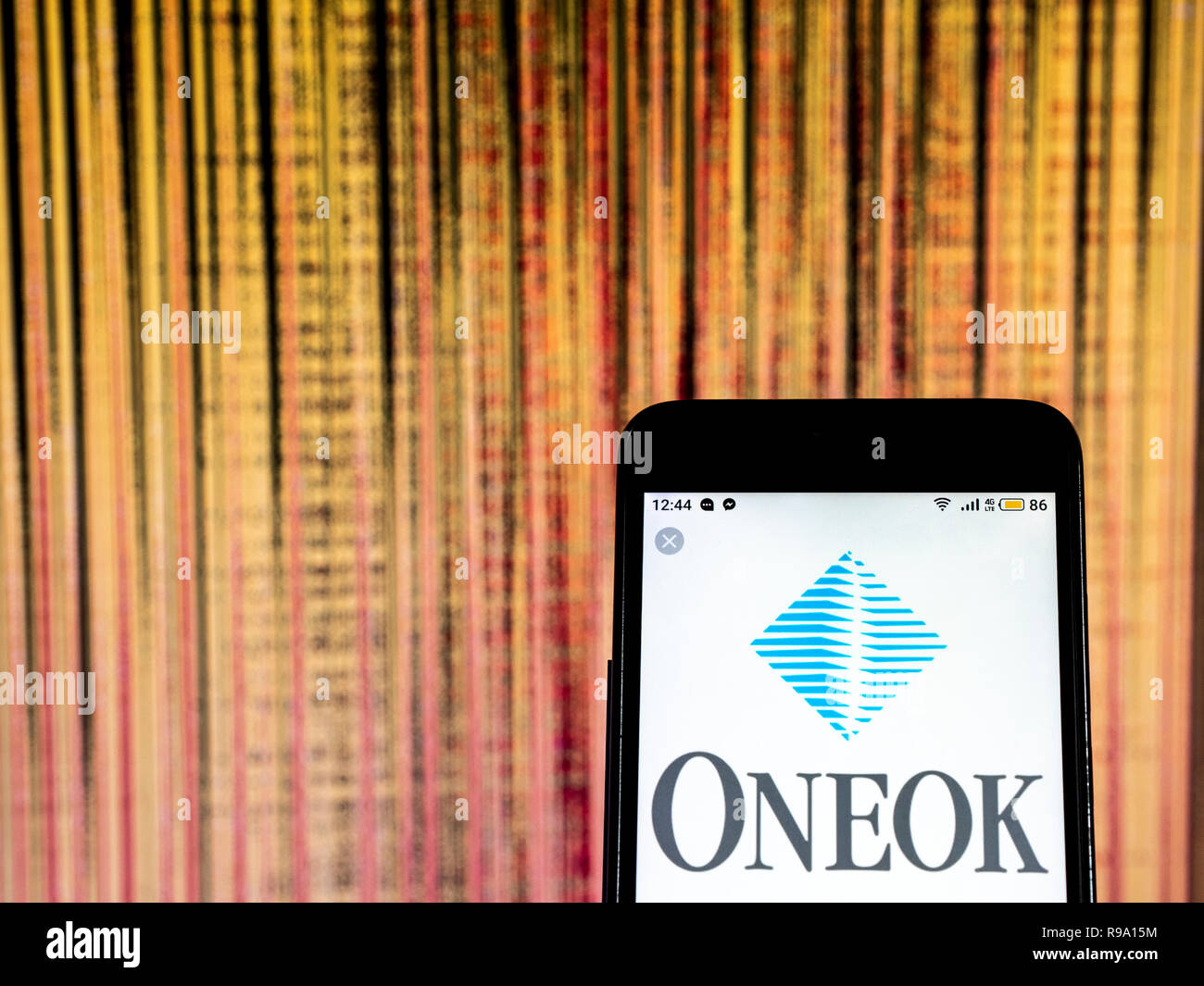 Oneok Natural gas liquids company logo seen displayed on smart phone ...