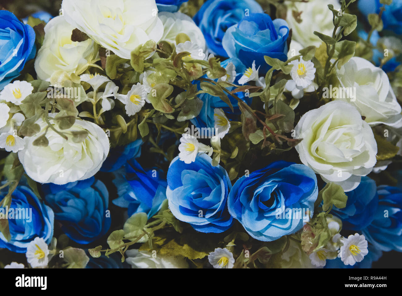 Plastic Roses Flowers Background Stock Photo - Alamy