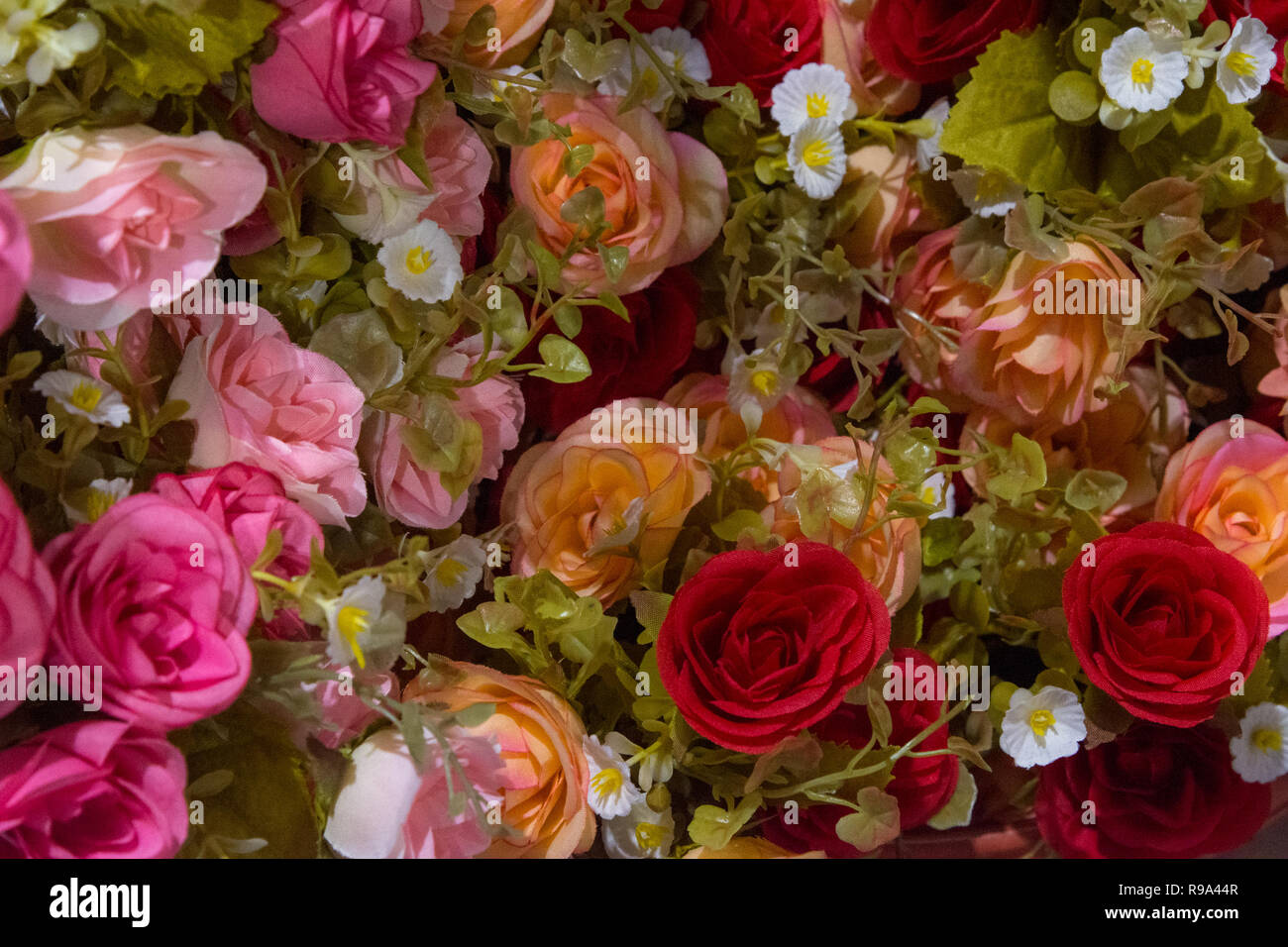 Plastic Roses Flowers Background Stock Photo - Alamy
