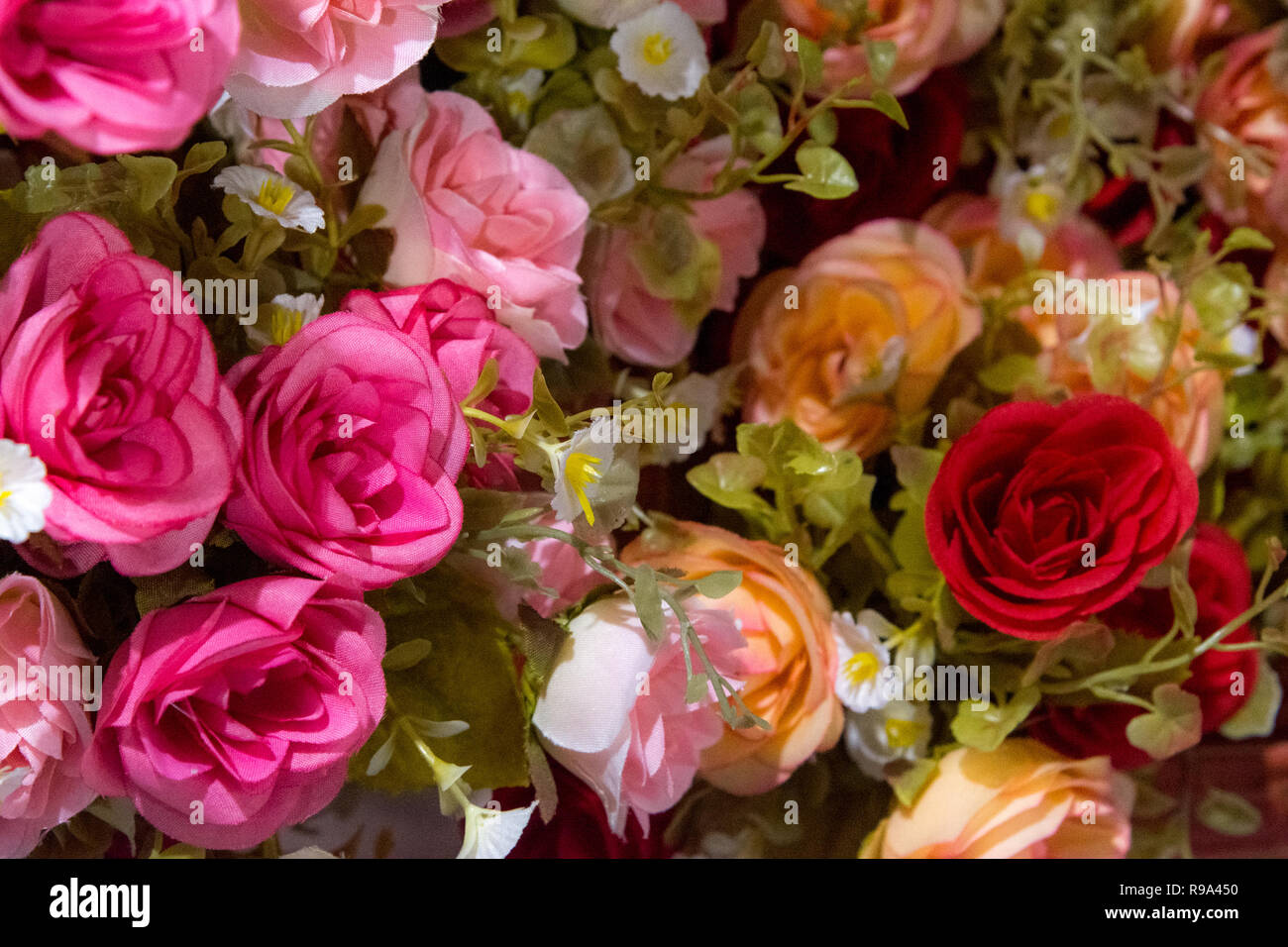 Plastic Roses Flowers Background Stock Photo - Alamy