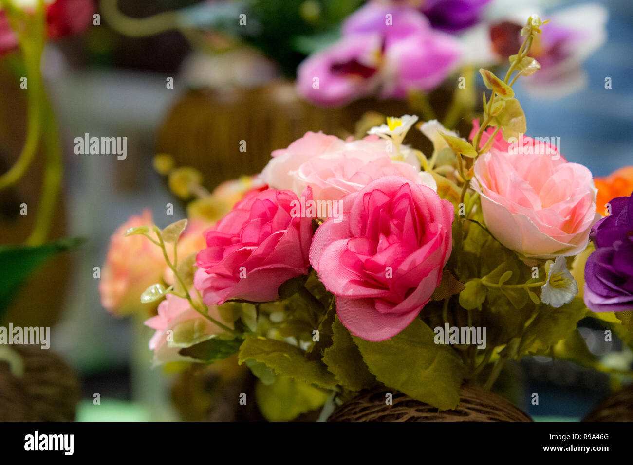 Plastic Roses Flowers Background Stock Photo - Alamy