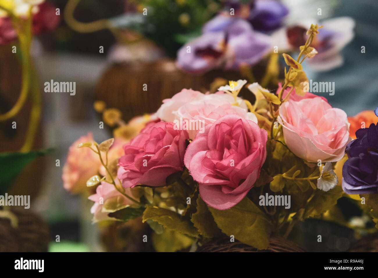 Plastic Roses Flowers Background Stock Photo - Alamy