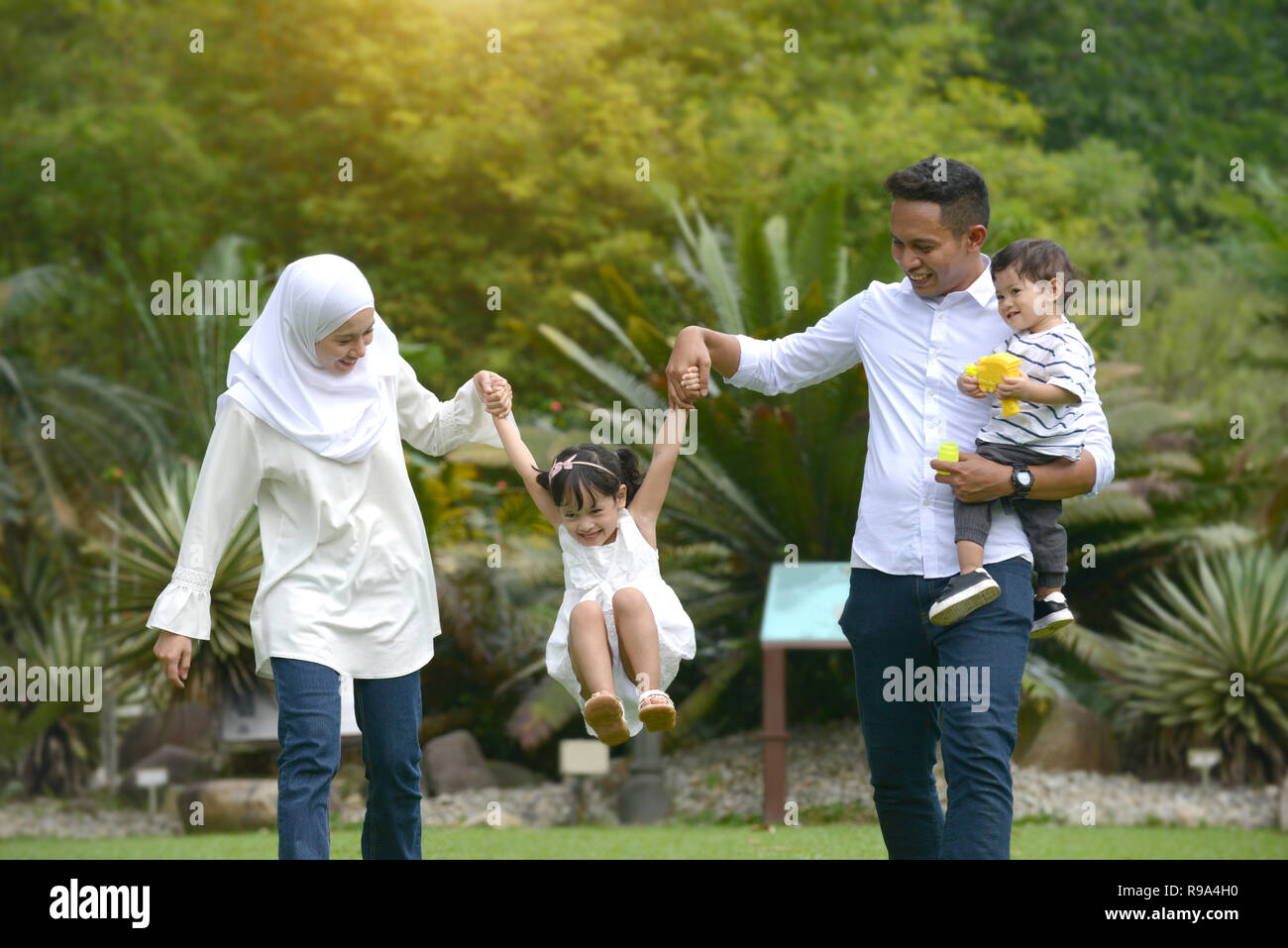 Happy malay father son in hi-res stock photography and images - Alamy