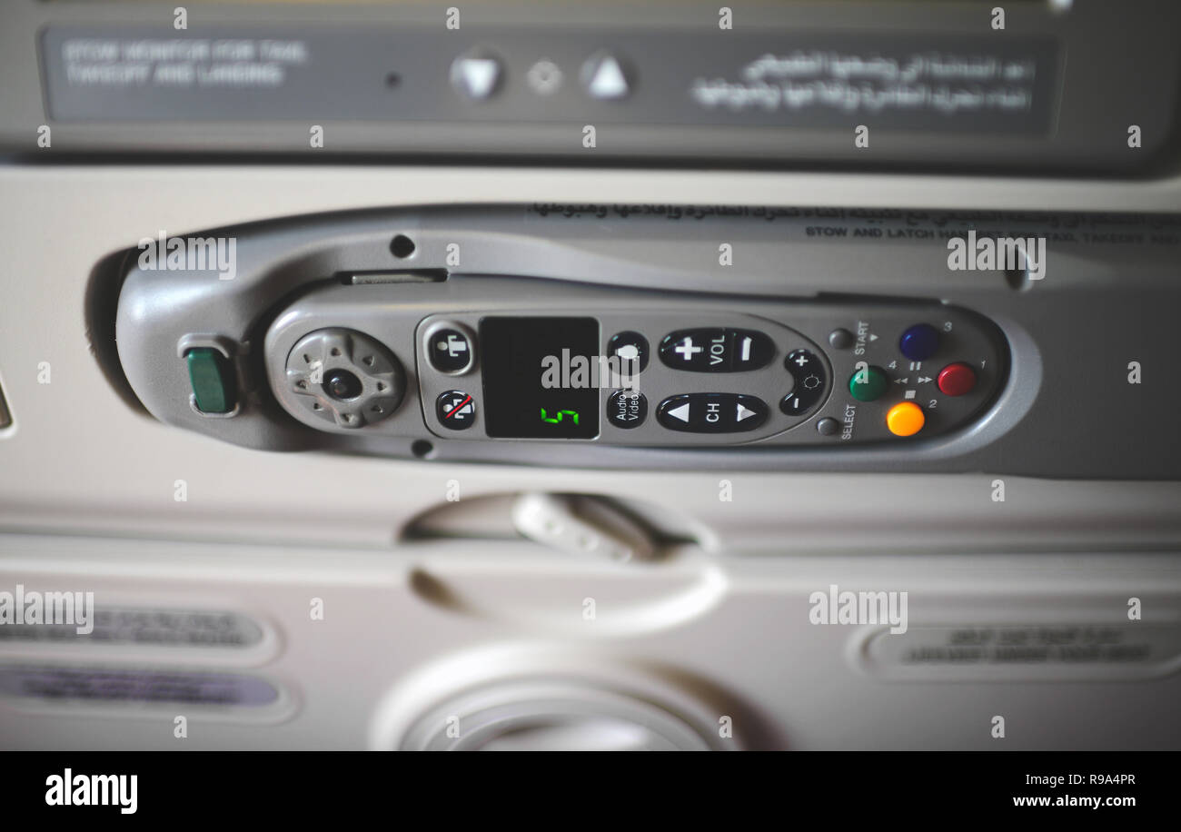 Entertainment control in Emirates flight Stock Photo - Alamy