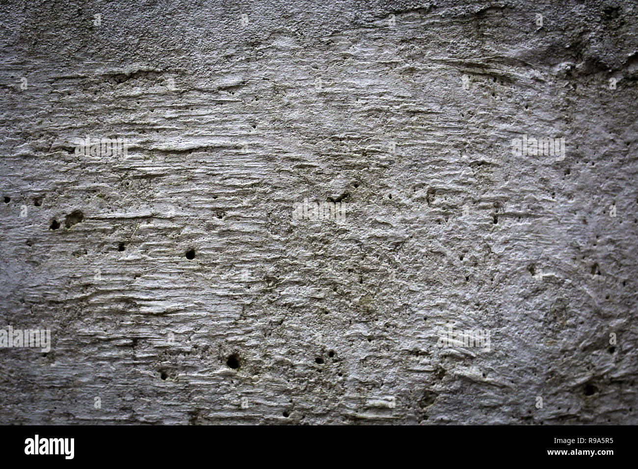 rough gray color wall texture. background for design with vignetting ...