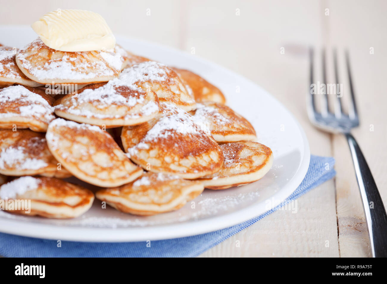 'Poffertjes': little Dutch pancakes with butter and powdered sugar ...