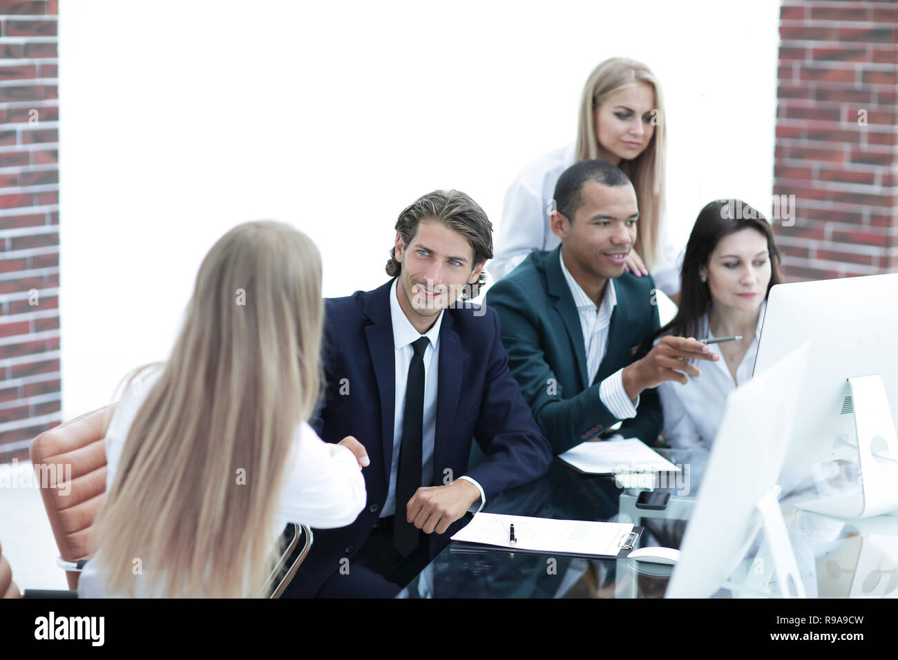handshake business people at the negotiating table Stock Photo - Alamy
