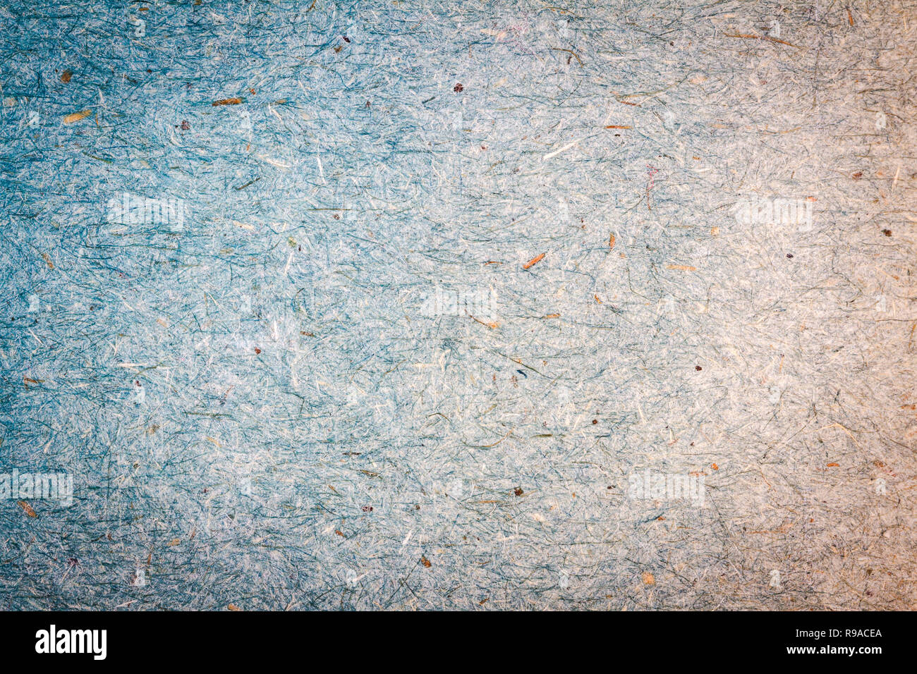 Blue and yellow handmade craft paper texture background. Old rough ...