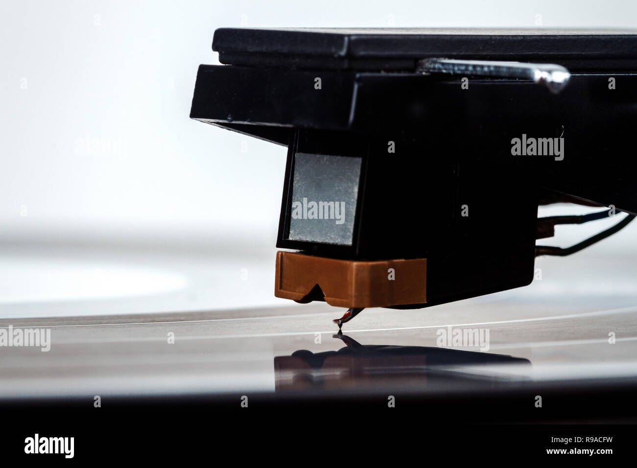 Close up of turntable needle on a vinyl record. Turntable playing vinyl ...