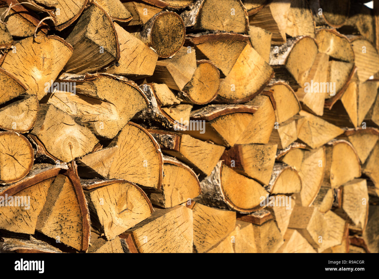 Pile of neatly stacked chopped timber logs for the fireplace Stock ...