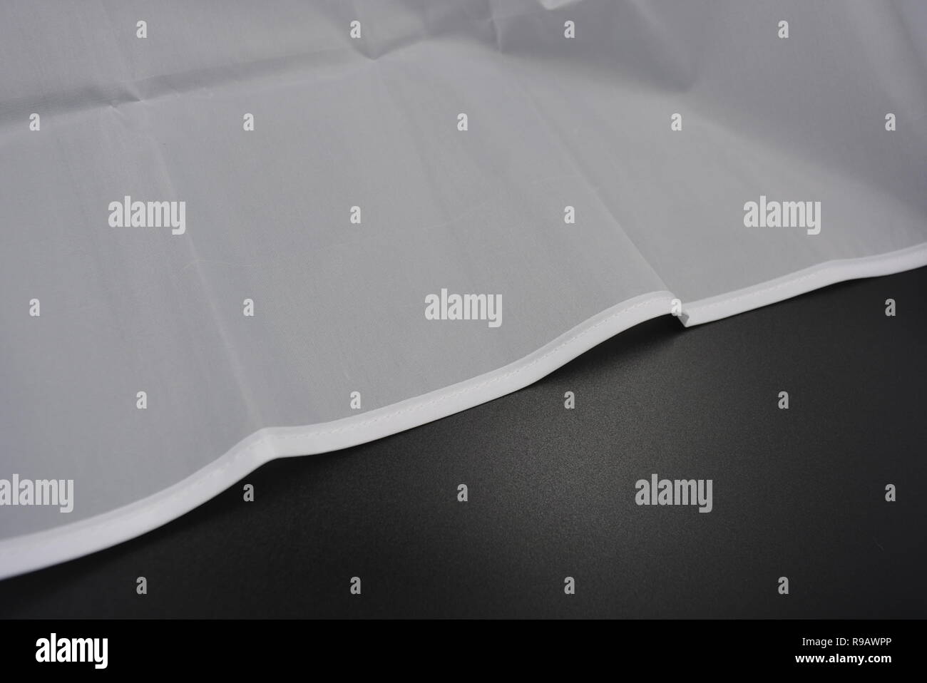 White translucent fabric for light scattering on a stylish black ...