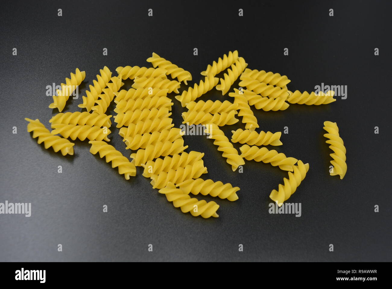 Italian yellow and dry vermicelli spiral, pasta with durum wheat and ...