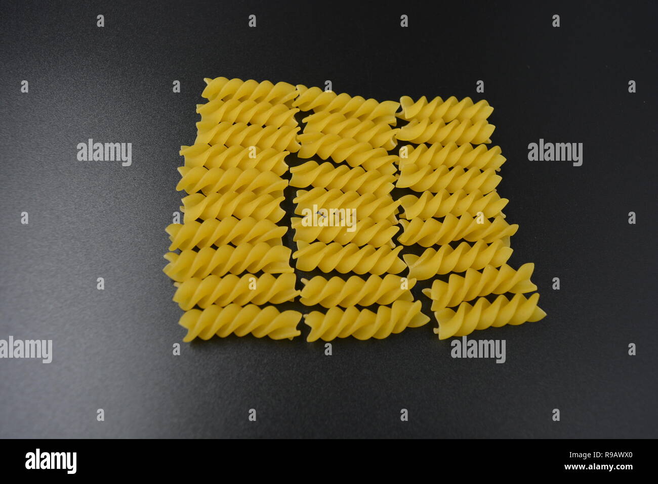 Italian yellow and dry vermicelli spiral, pasta with durum wheat and ...