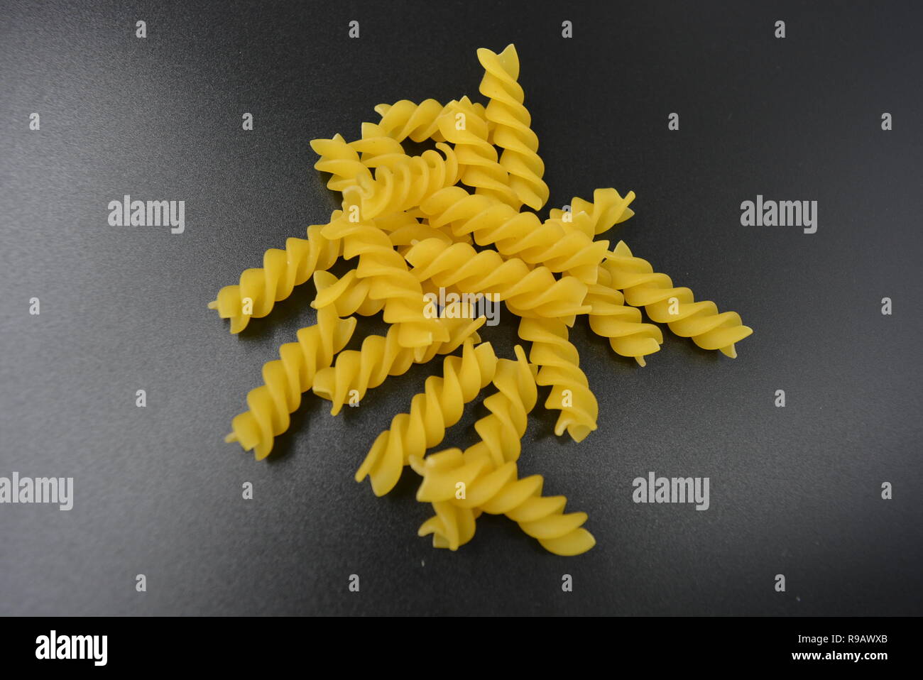 Italian yellow and dry vermicelli spiral, pasta with durum wheat and ...