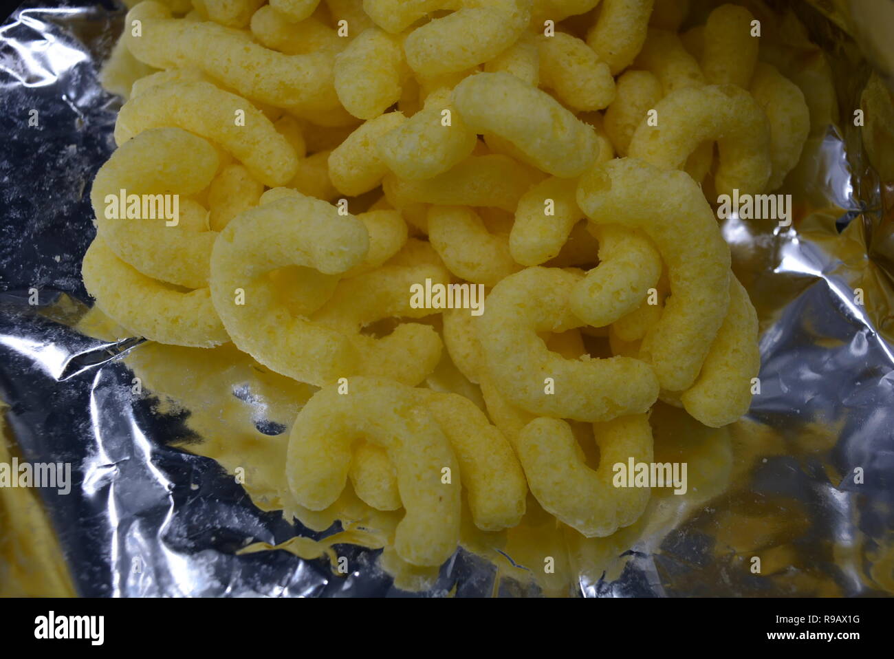 Delicious sweet corn sticks in silver packaging, snack, fast food Stock ...