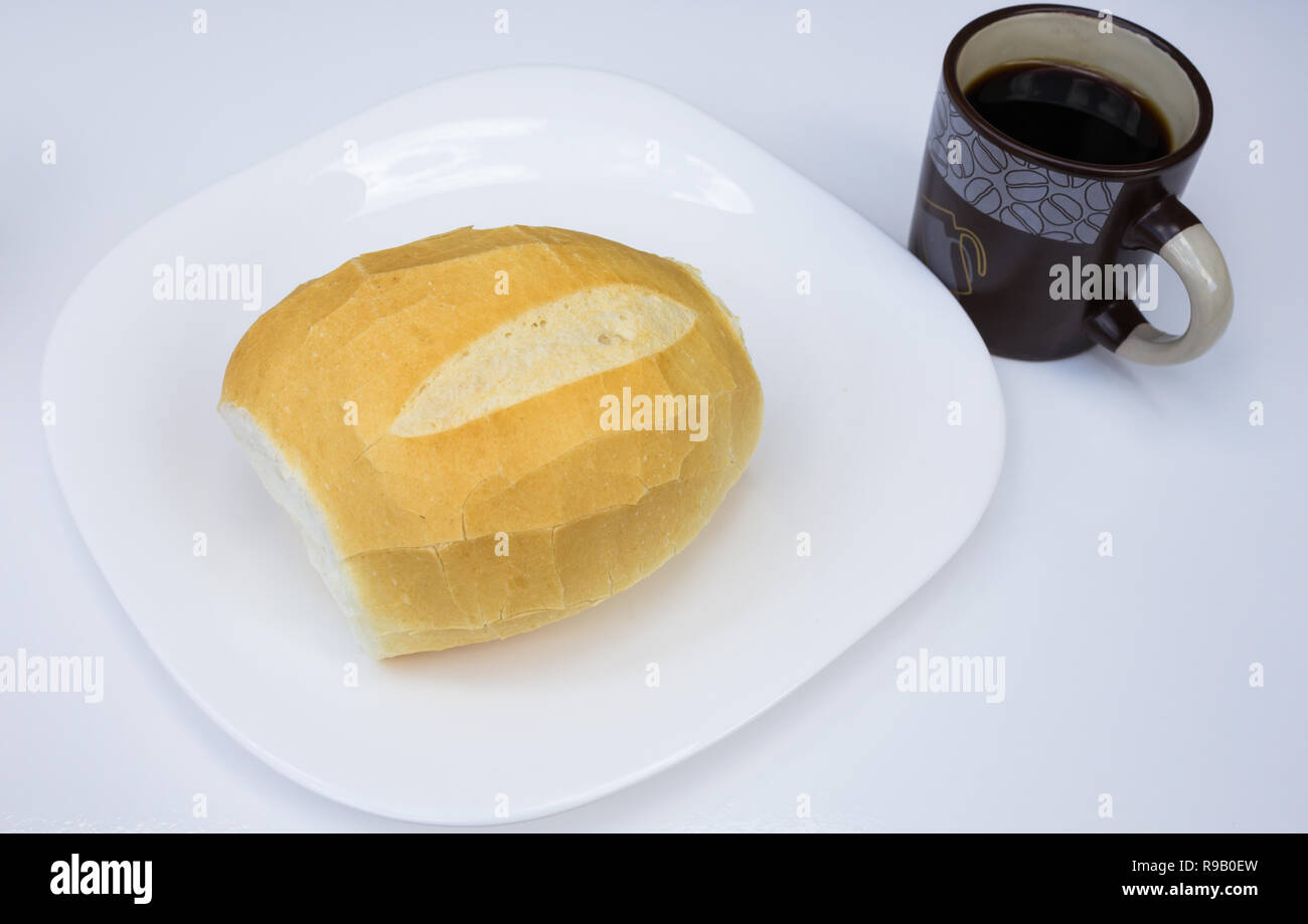 "French bread", traditional breakfast Brazilian, served with coffee on ...