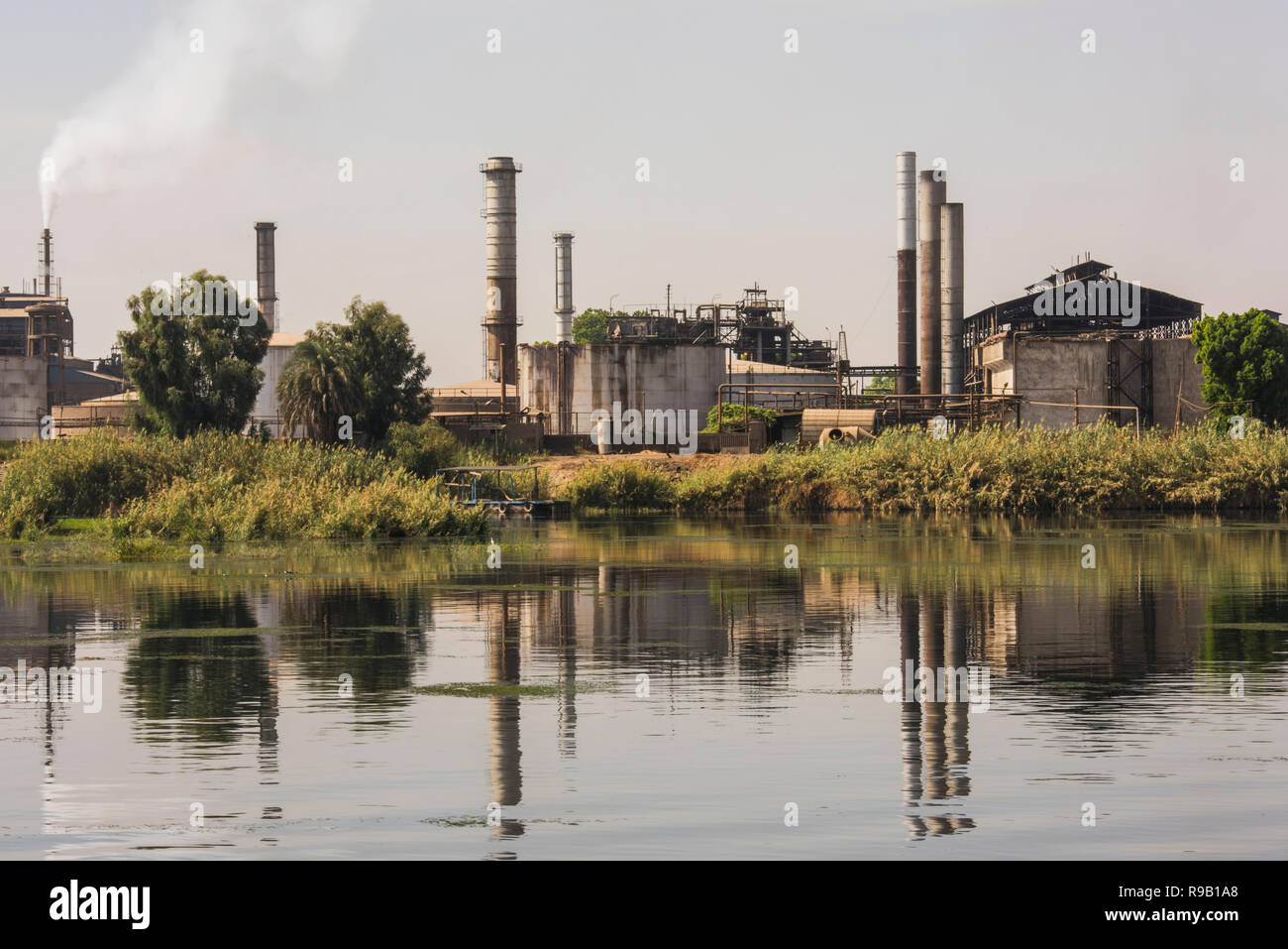 View across large river Nile in Egypt through rural landscape with ...