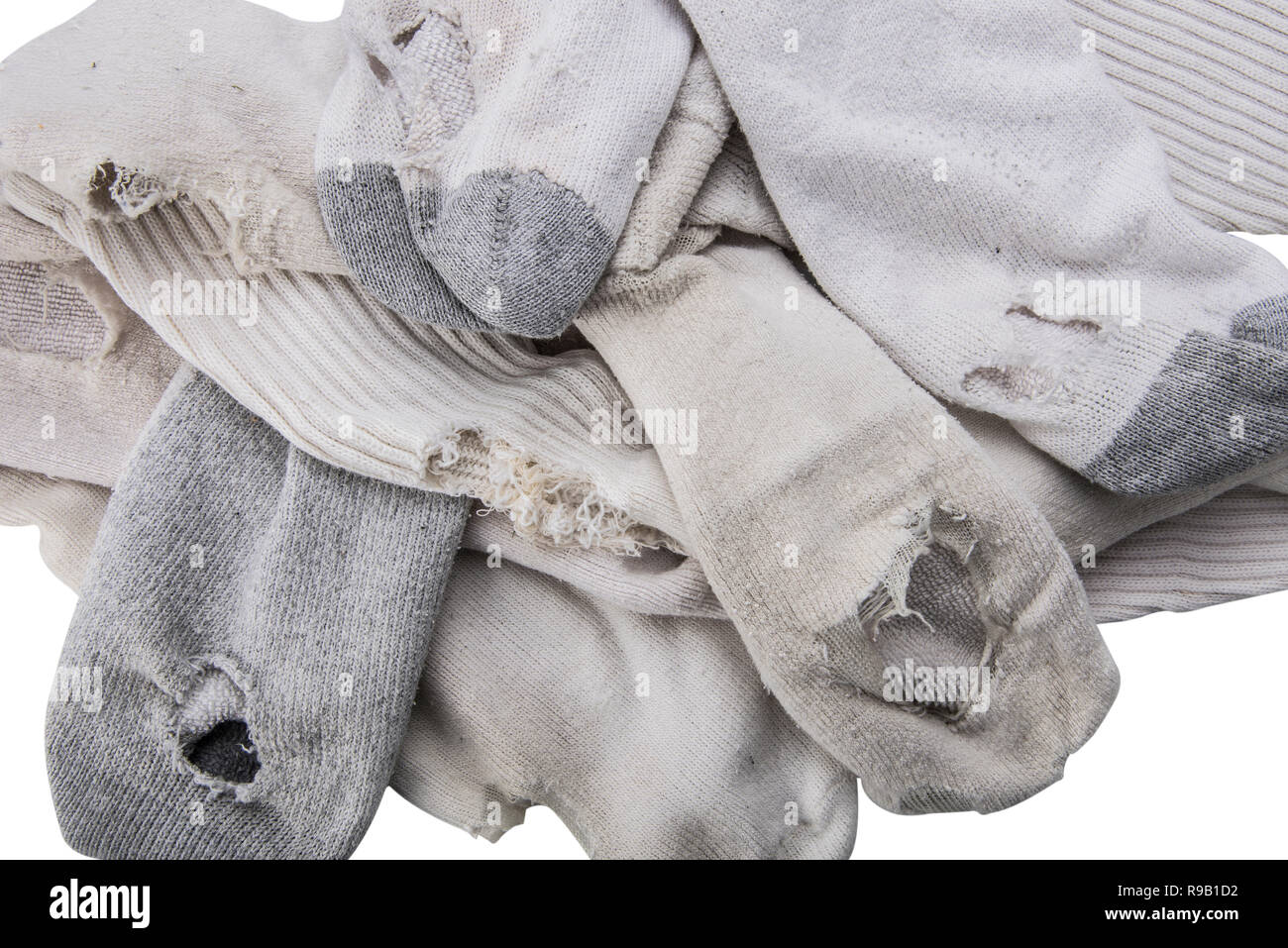 Pile of old white socks with holes overhead Stock Photo - Alamy