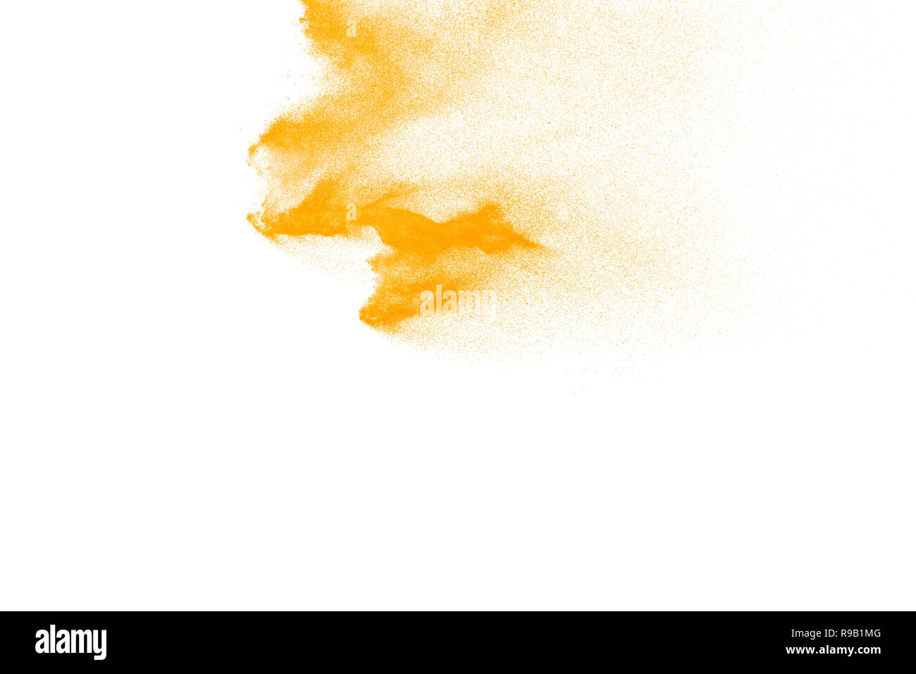 Yellow particles explosion on white background. Freeze motion of yellow ...