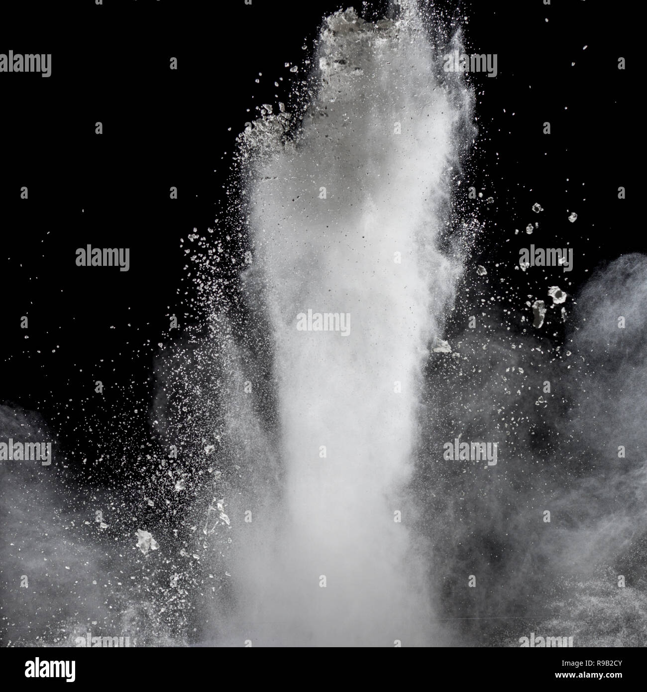 White powder dust particles explosion on a black background Stock Photo ...
