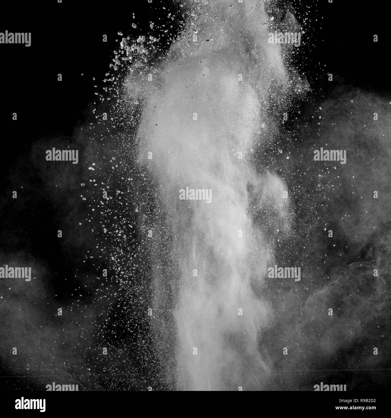 White powder dust particles explosion on a black background Stock Photo ...