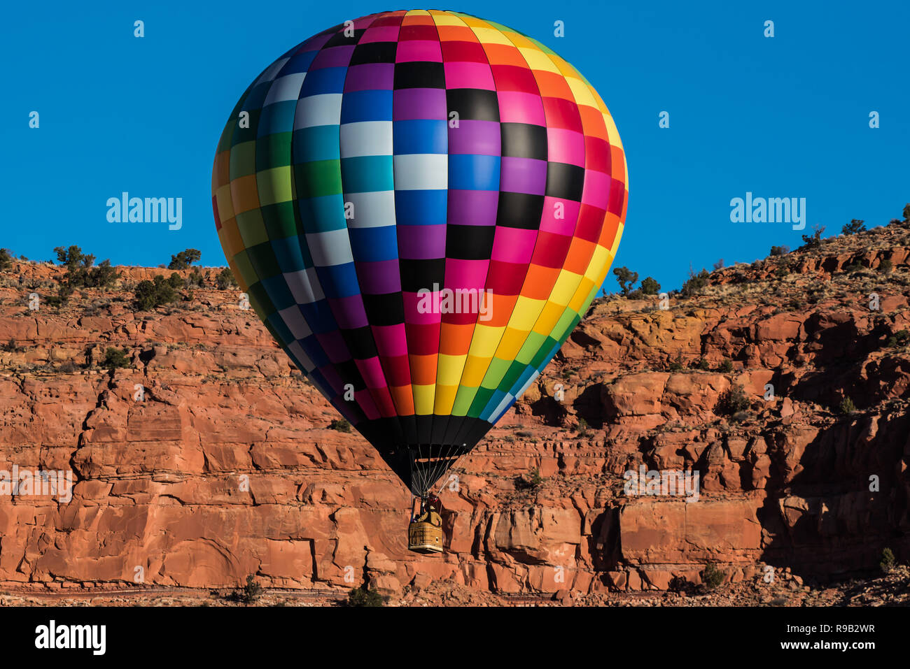 High red cliffs that contrast with the blue sky hi-res stock ...