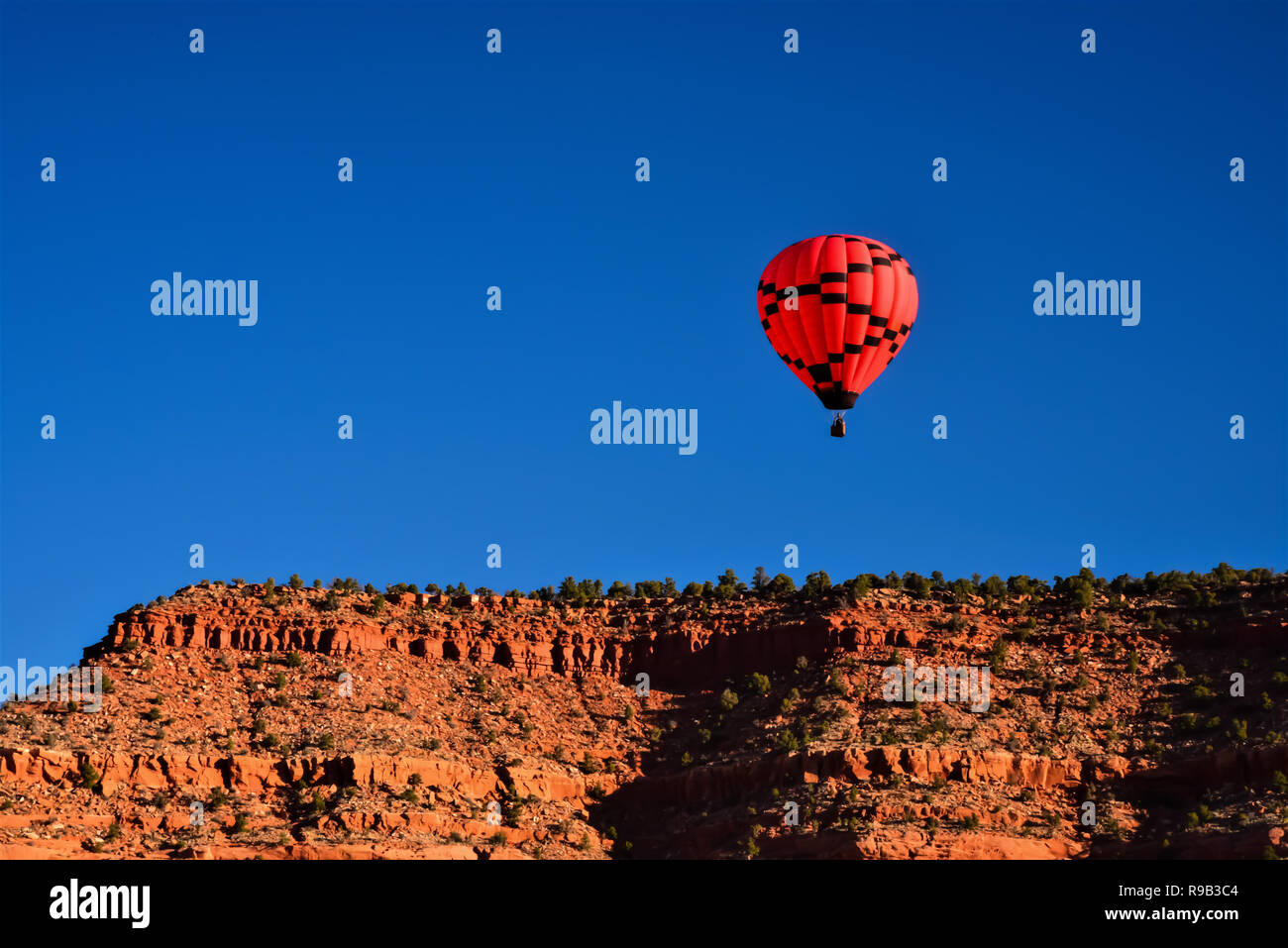High red cliffs that contrast with the blue sky hi-res stock ...