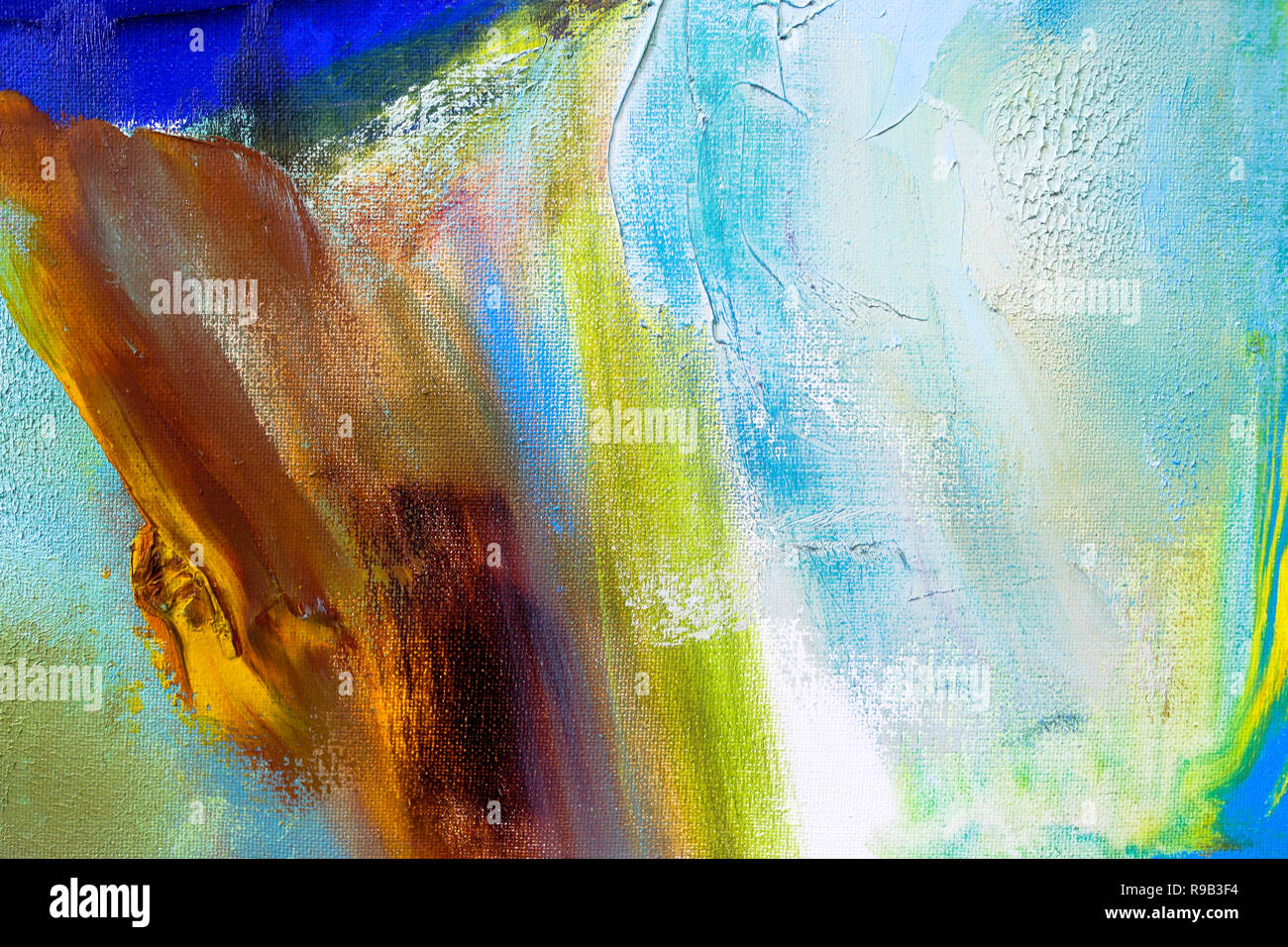 multi-colored strokes of oil paint on the artist's palette. the texture ...
