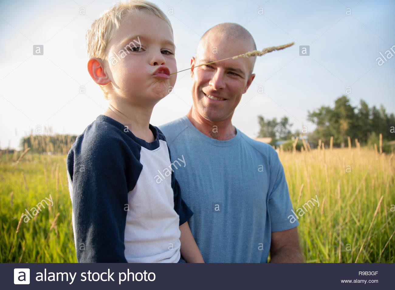 Father holding son hi-res stock photography and images - Alamy