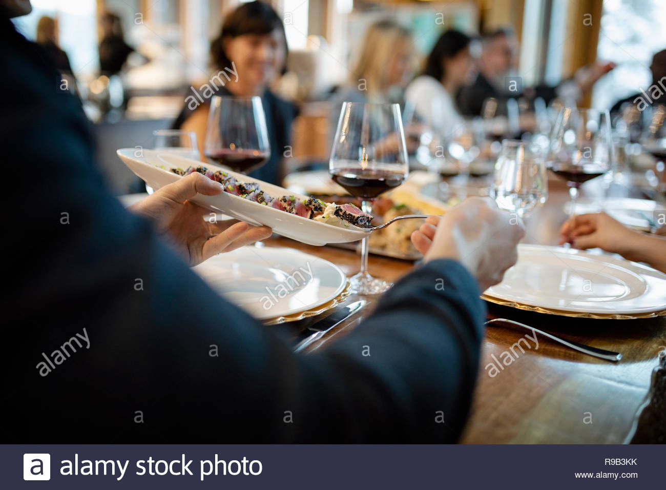 Man eating dinner table hi-res stock photography and images - Alamy