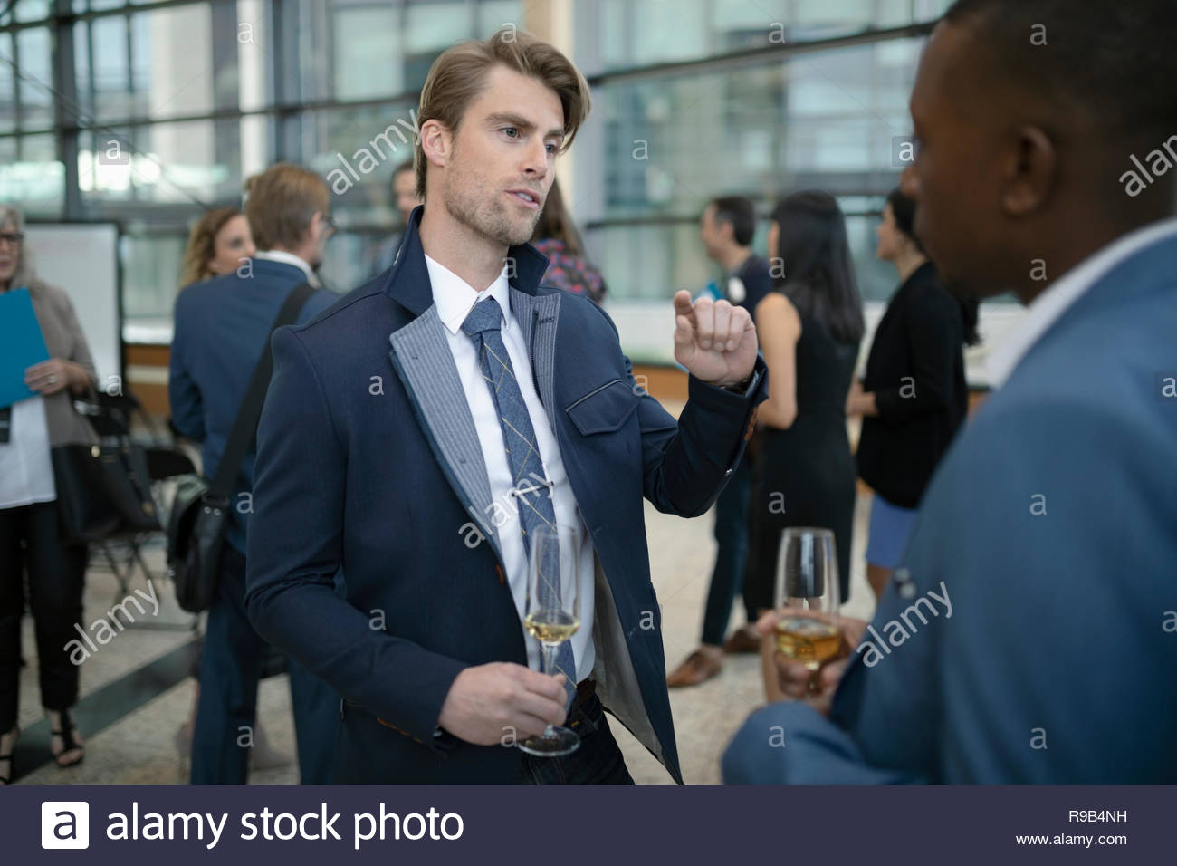 Businessmen drinking together wine hi-res stock photography and images ...