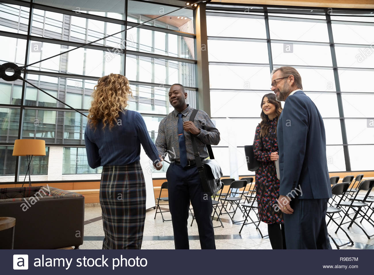 Asian american businessman greeting hi-res stock photography and images ...