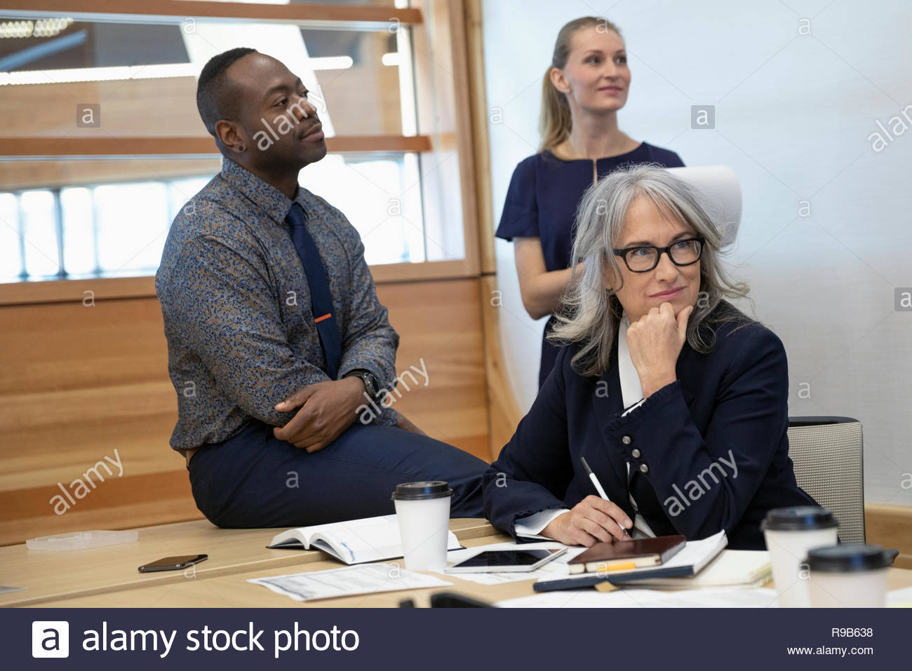 Attentive people hi-res stock photography and images - Alamy
