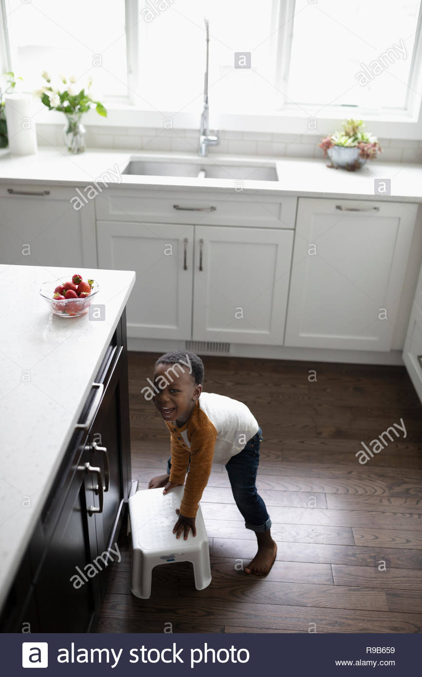Boy stepping hi-res stock photography and images - Alamy