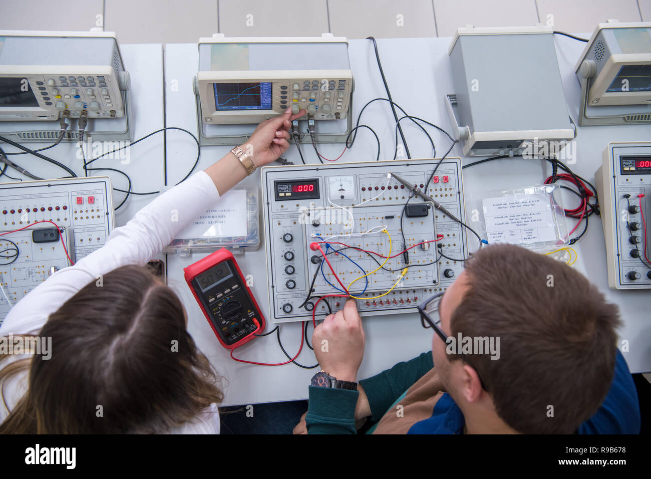 top view of a Group young students doing technical vocational practice ...