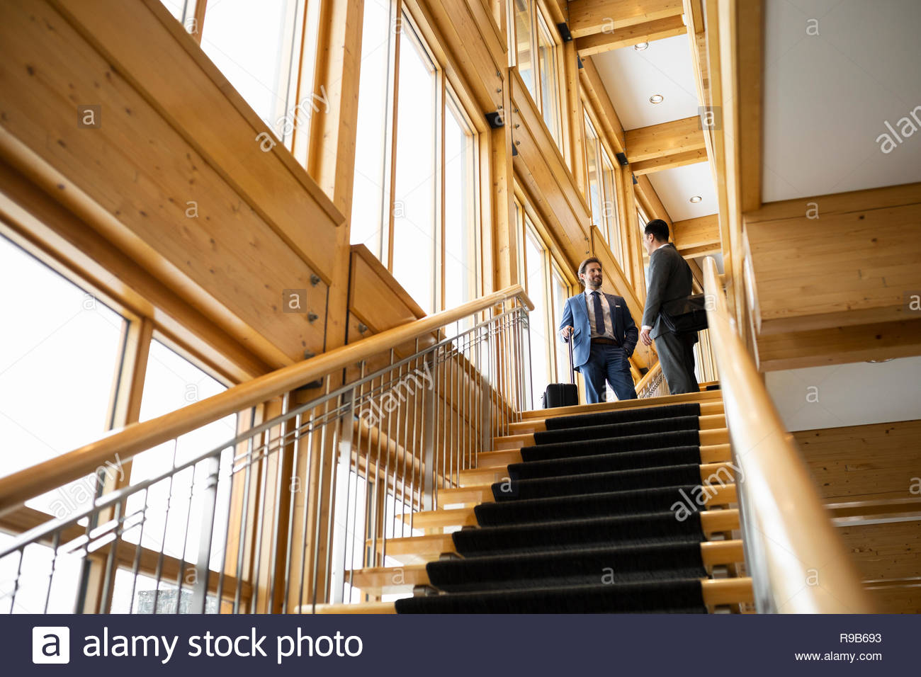 Man standing at top of stairs hi-res stock photography and images - Alamy