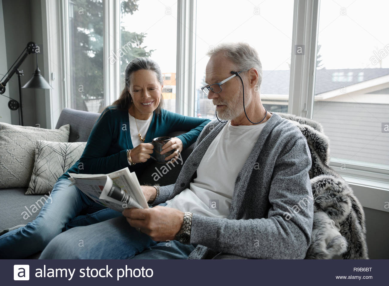 Two men reading newspaper hi-res stock photography and images - Alamy