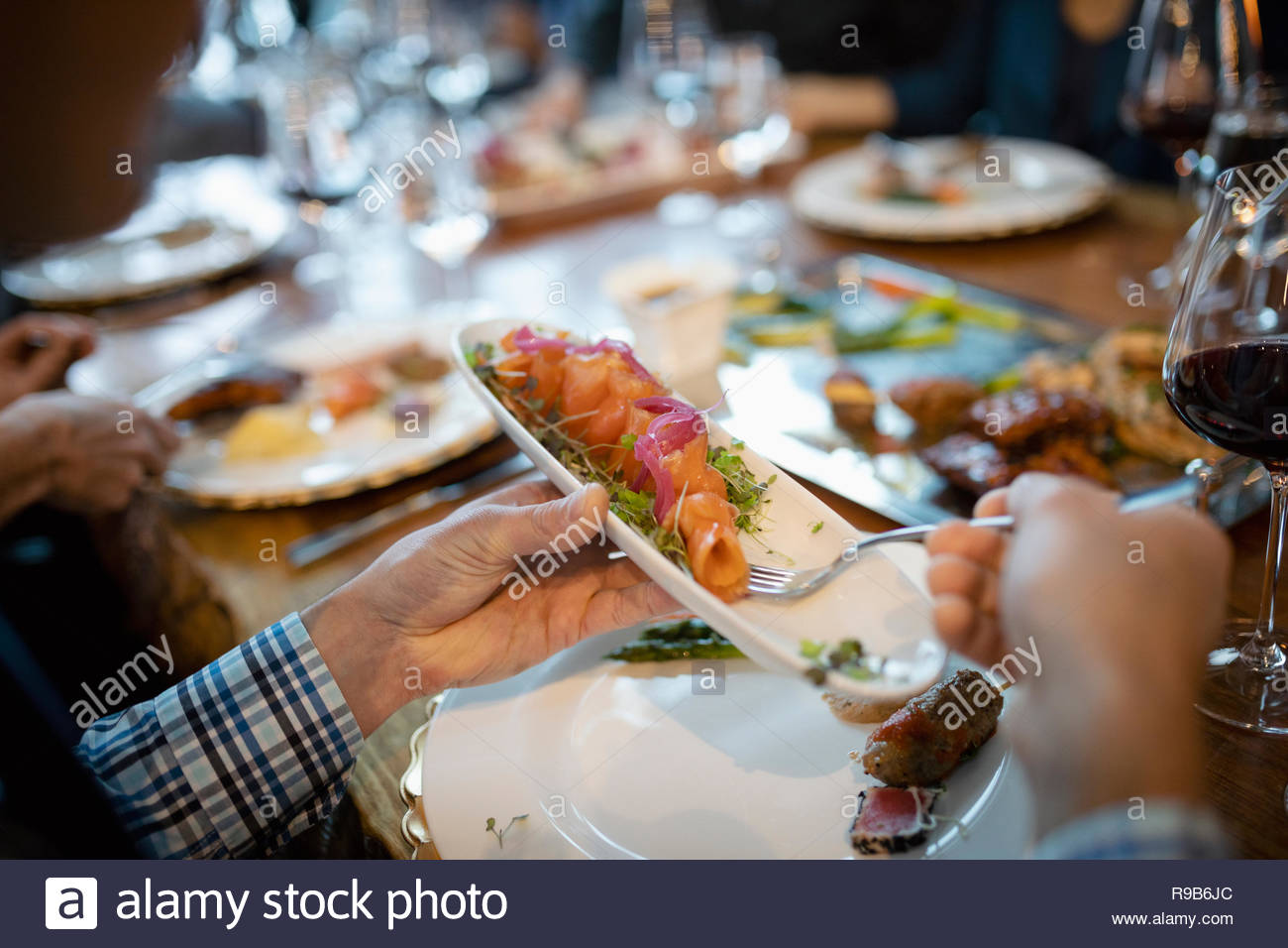Man eating dinner table hi-res stock photography and images - Alamy