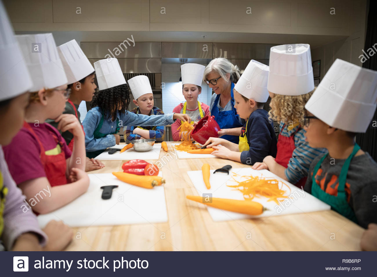 Children talking together and classroom hi-res stock photography and ...