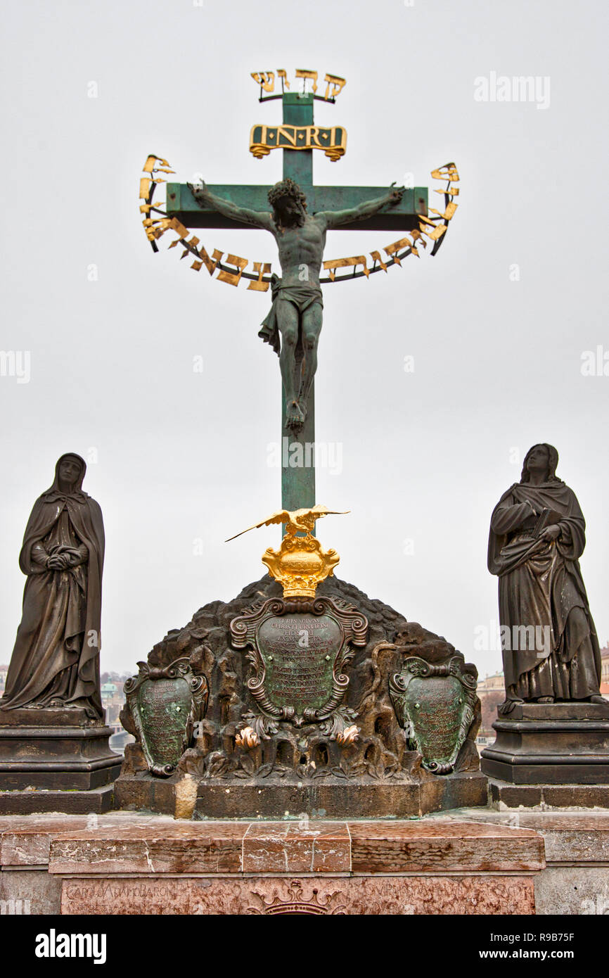 Statue of the Holy Crucifix and Calvary on Charles Bridge in Prague ...