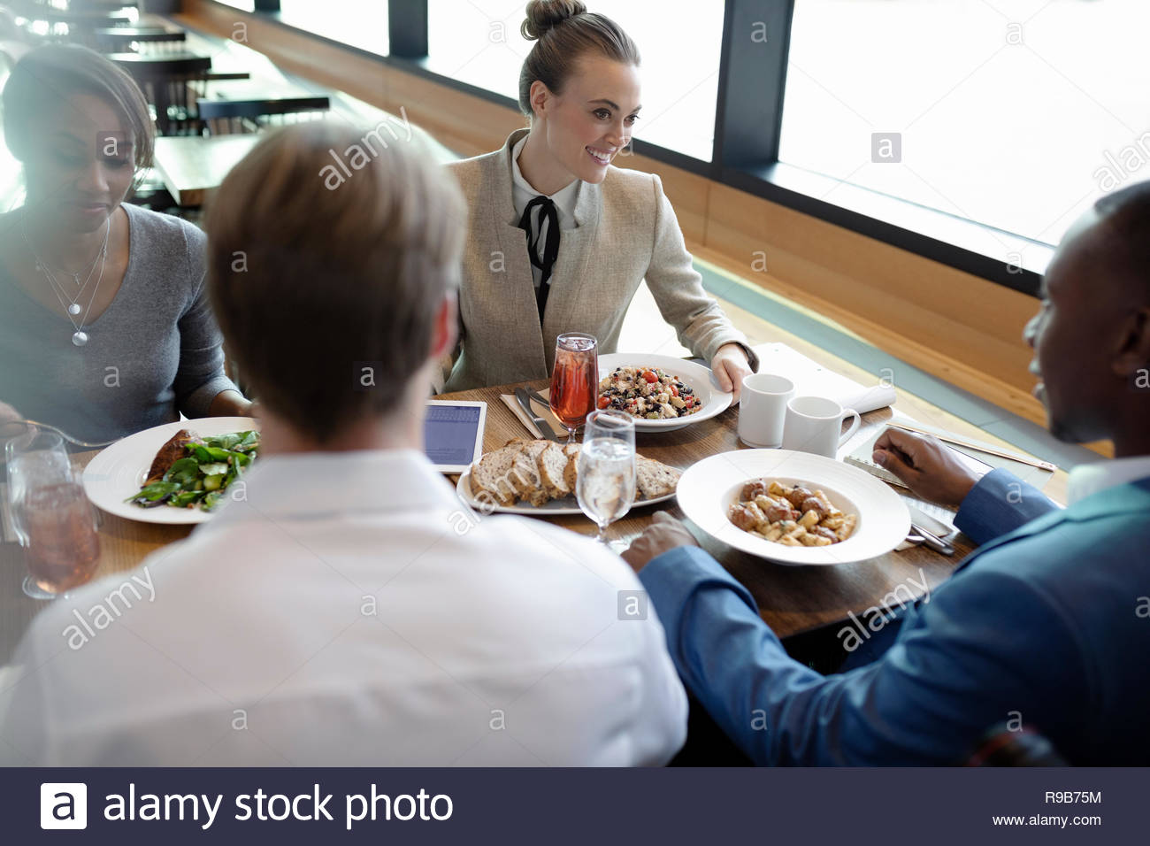 Black man eating lunch in hi-res stock photography and images - Alamy