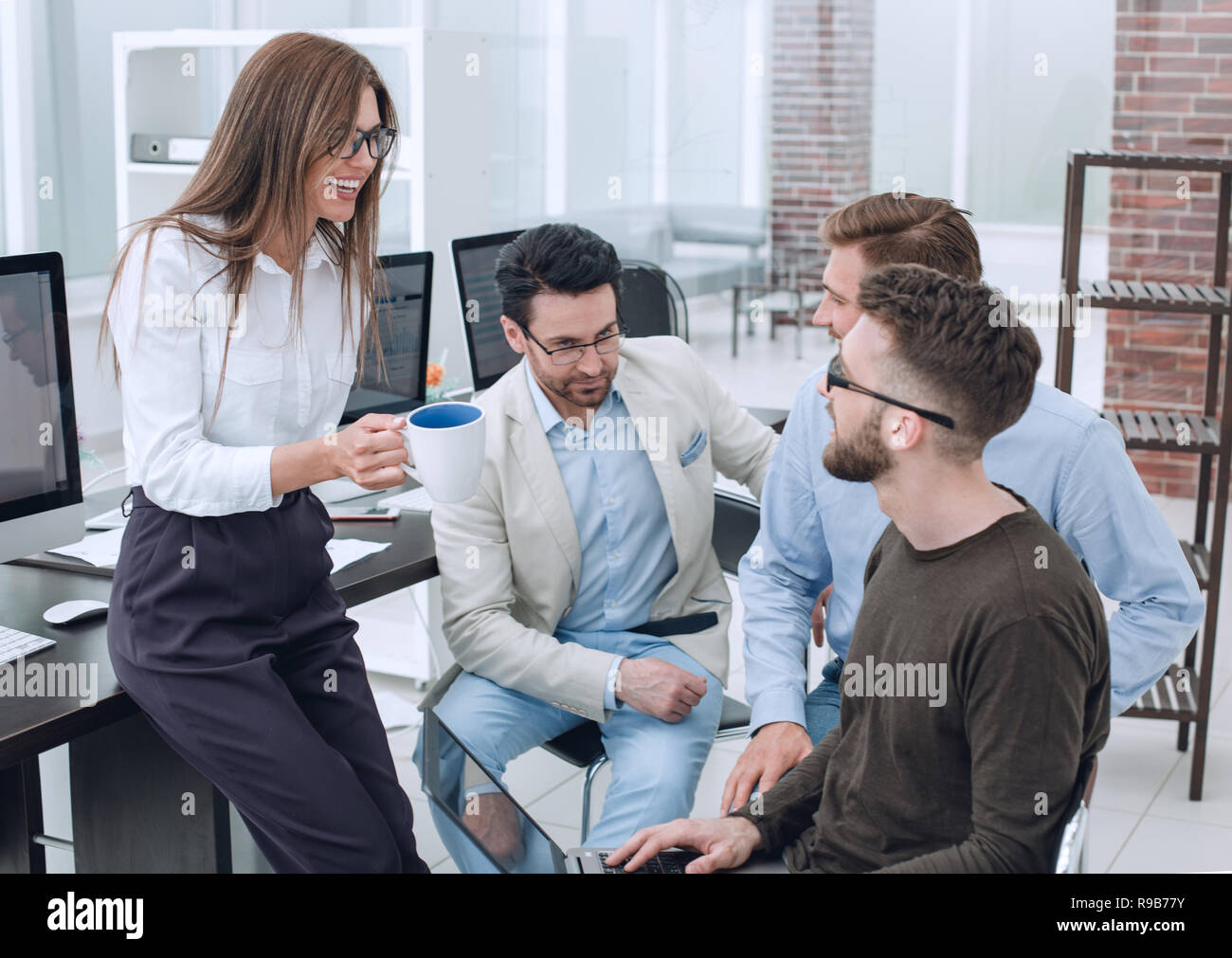 business woman and business team talking during work break Stock Photo ...