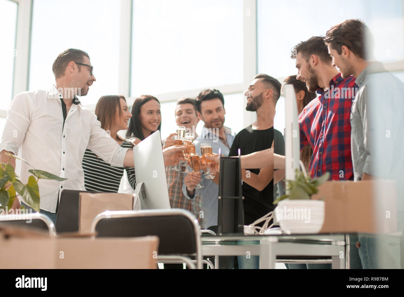 creative business team celebrates their startup Stock Photo - Alamy