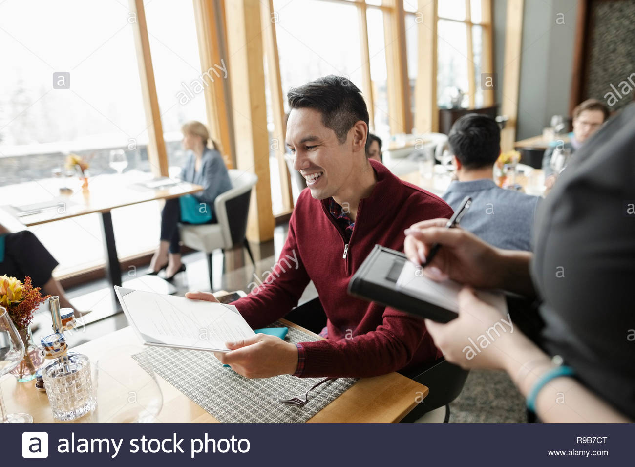 Man ordering drink hi-res stock photography and images - Alamy