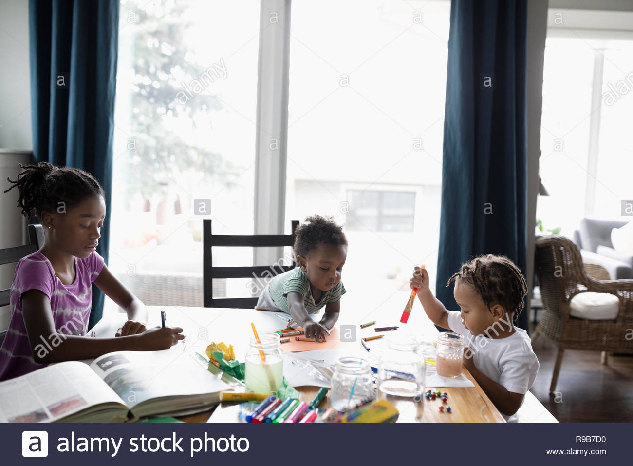 Brother sister homework hi-res stock photography and images - Alamy