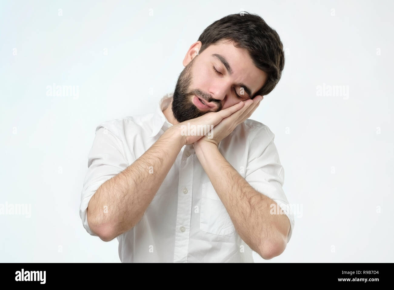 Bearded man with messy hair and beard, being tired after hard day Stock ...
