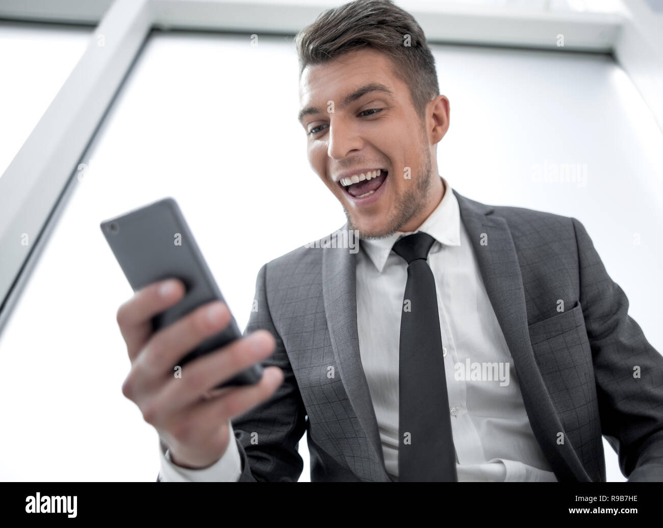 happy man with phone Stock Photo - Alamy