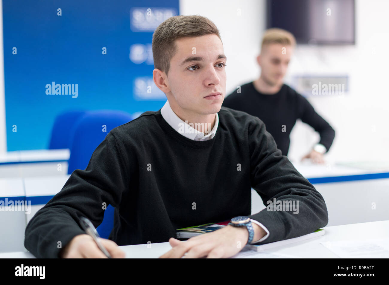 Male student sitting school hi-res stock photography and images - Alamy